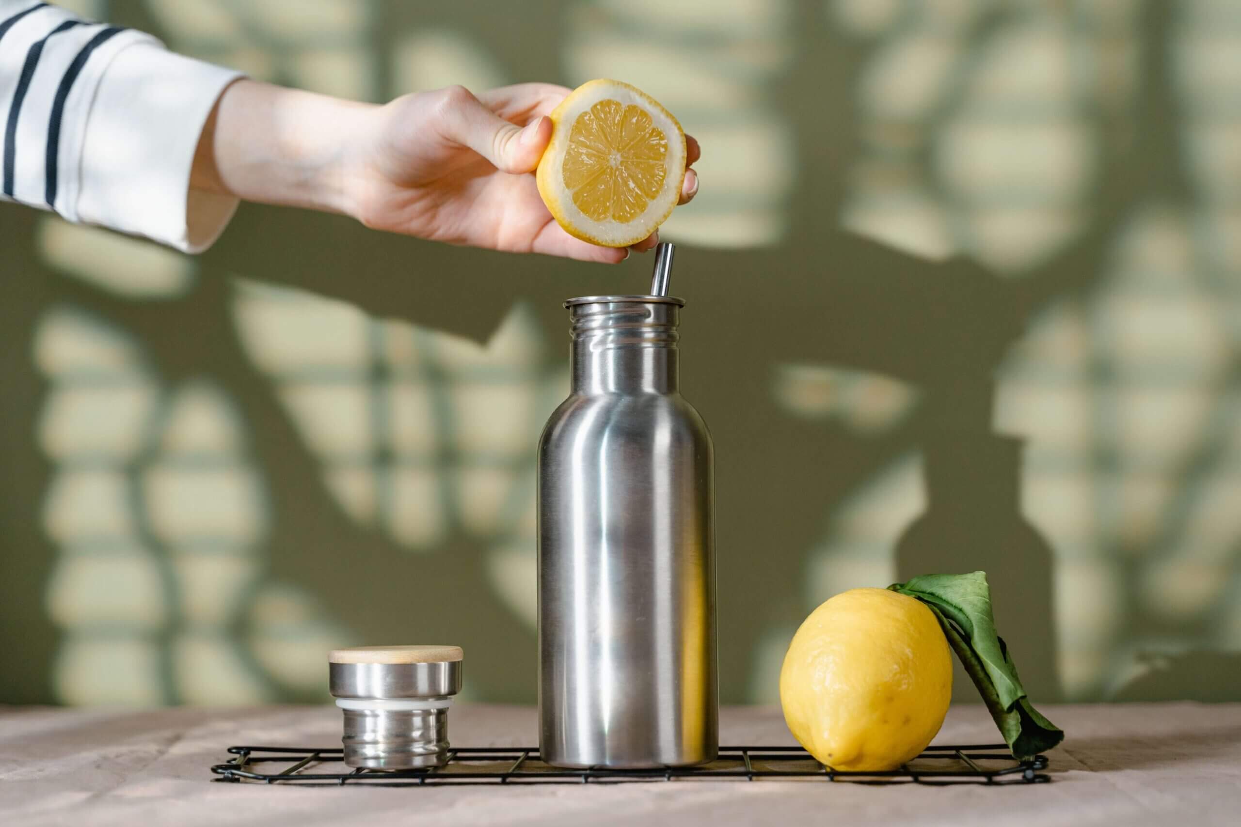 How to Finally Organize Water Bottles in the Kitchen - The Happy Wallflower